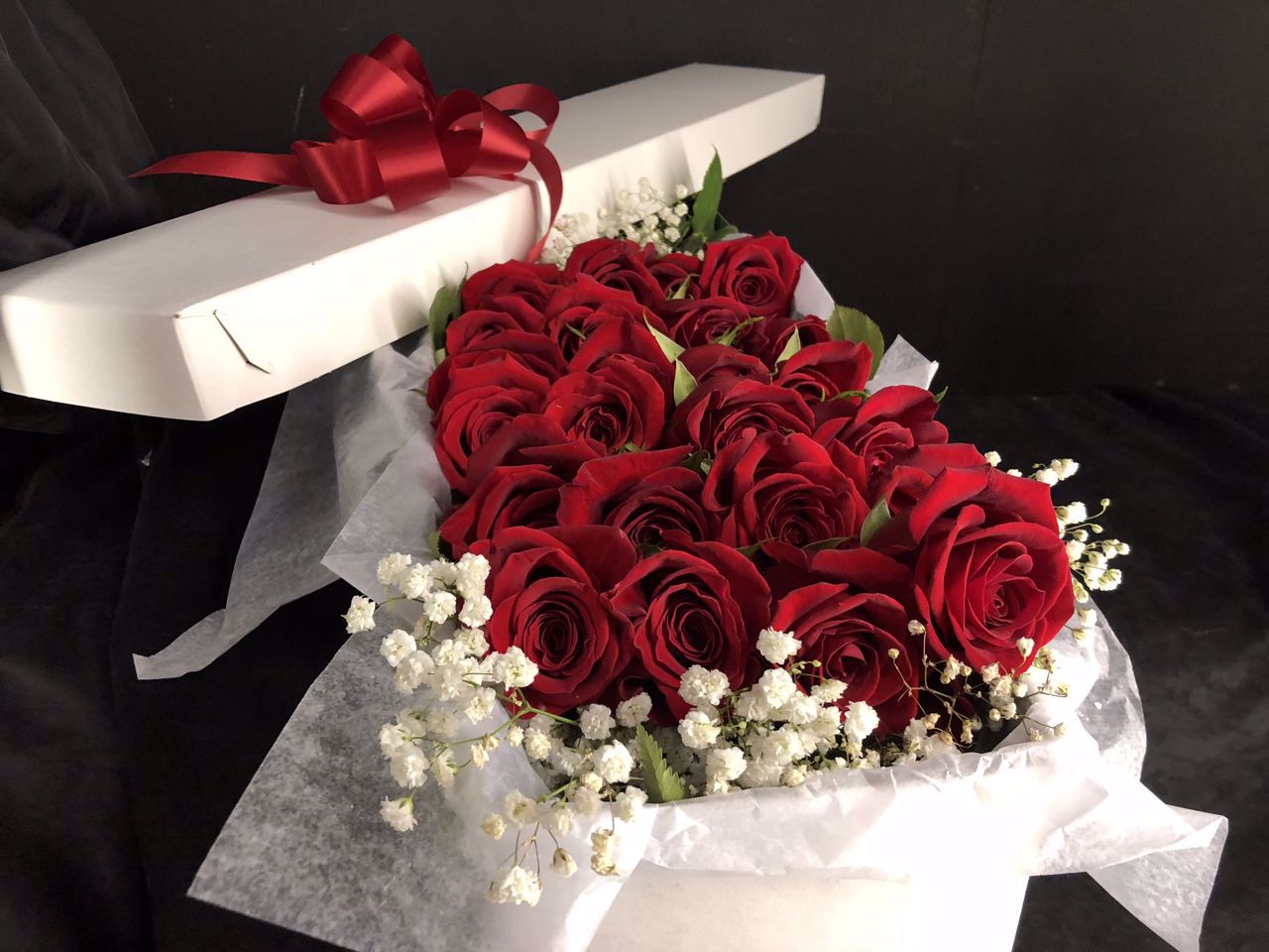 Your store. 24 Red Grande Roses