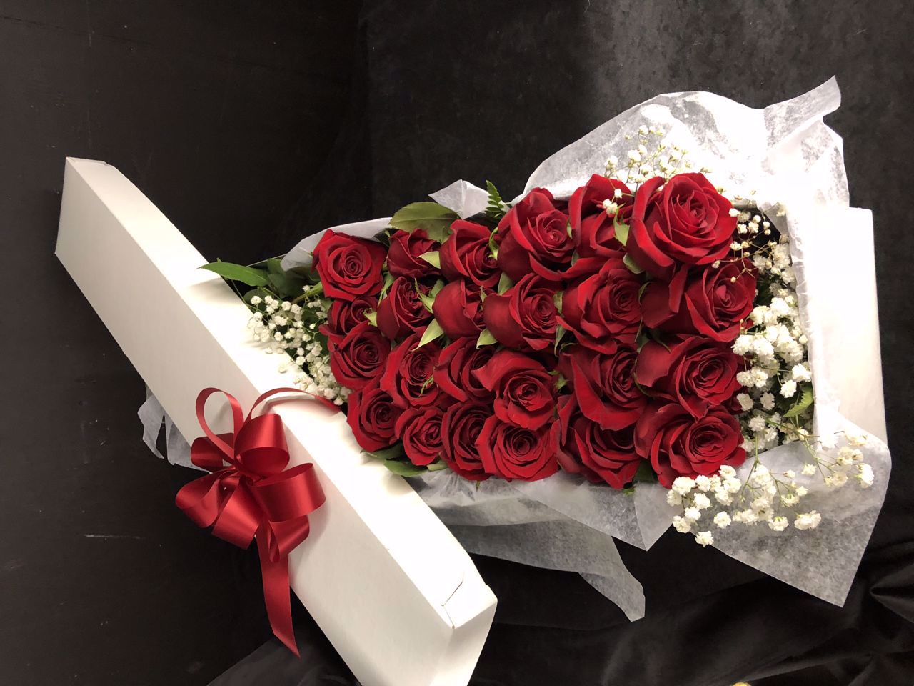 Your store. 24 Red Grande Roses